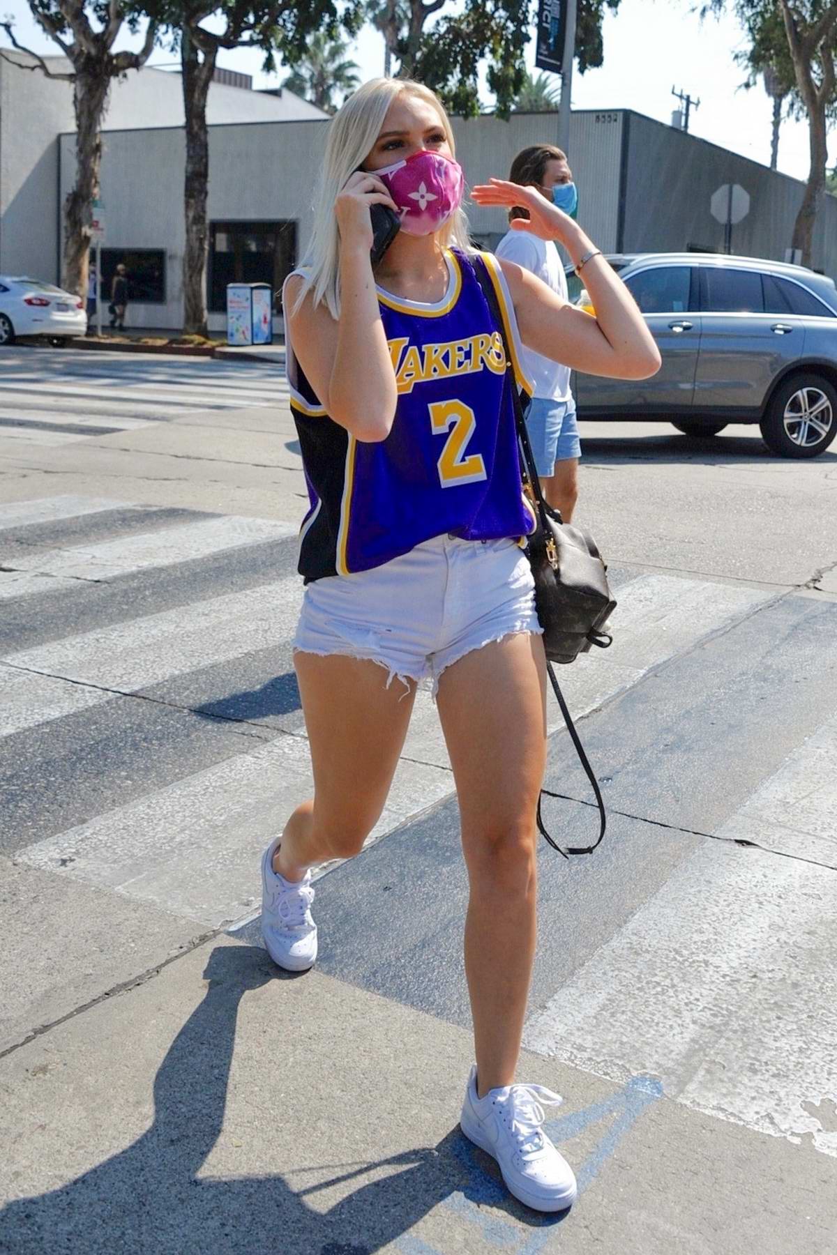 Jordyn Jones Sports A Lakers Top And Tiny Denim Shorts While Out For